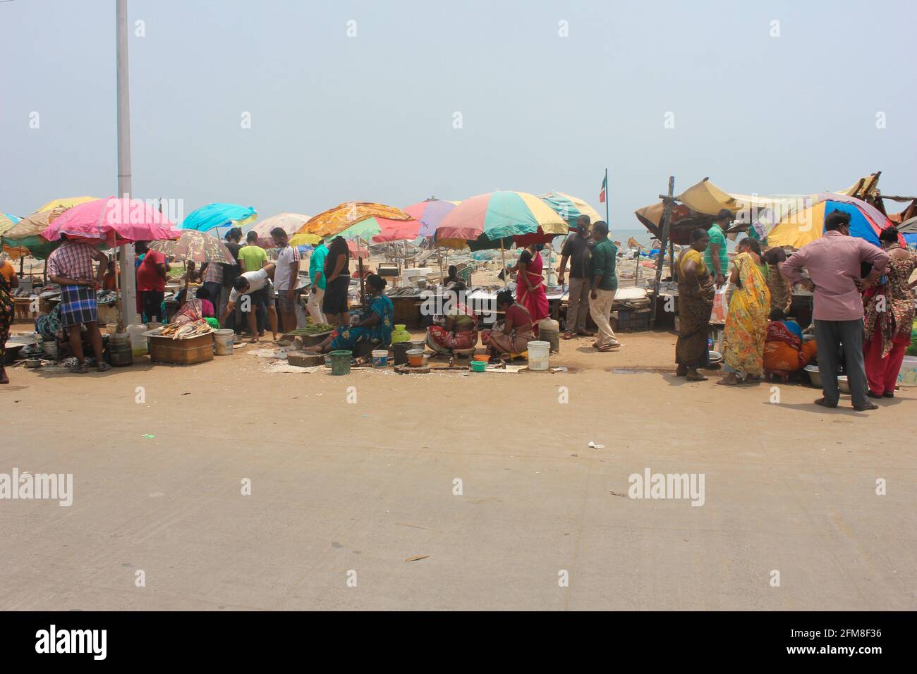 Noisy and crowded evening fish market in chennai, Fish prepared to ...