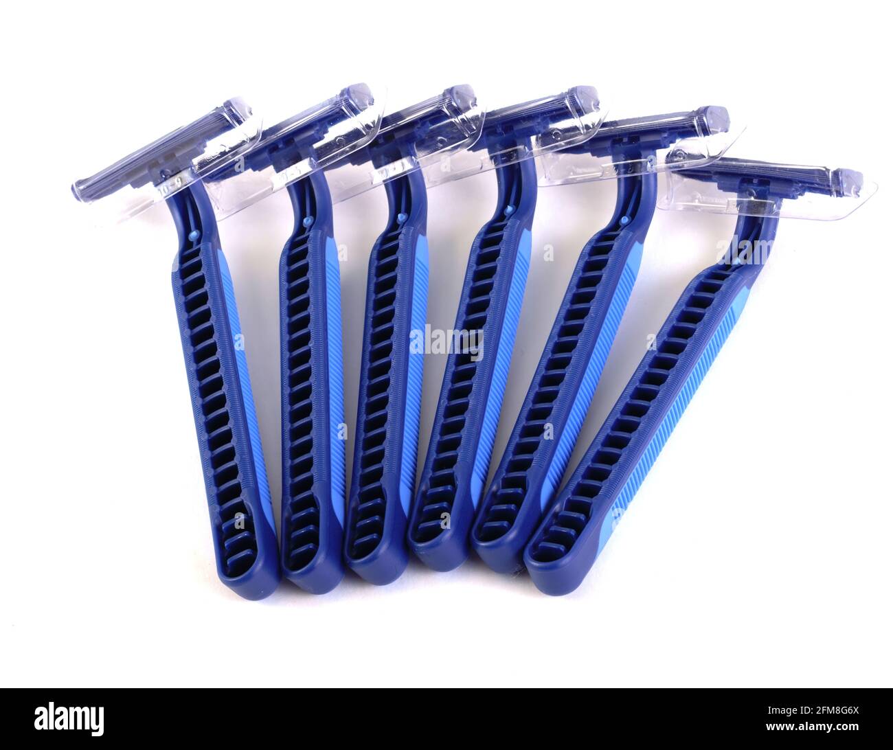 blue razor blades on white background Stock Photo - Alamy