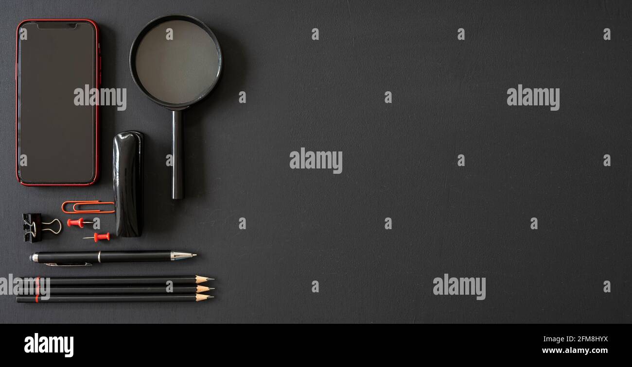 Office black workspace with office supplies and copy space on black ...