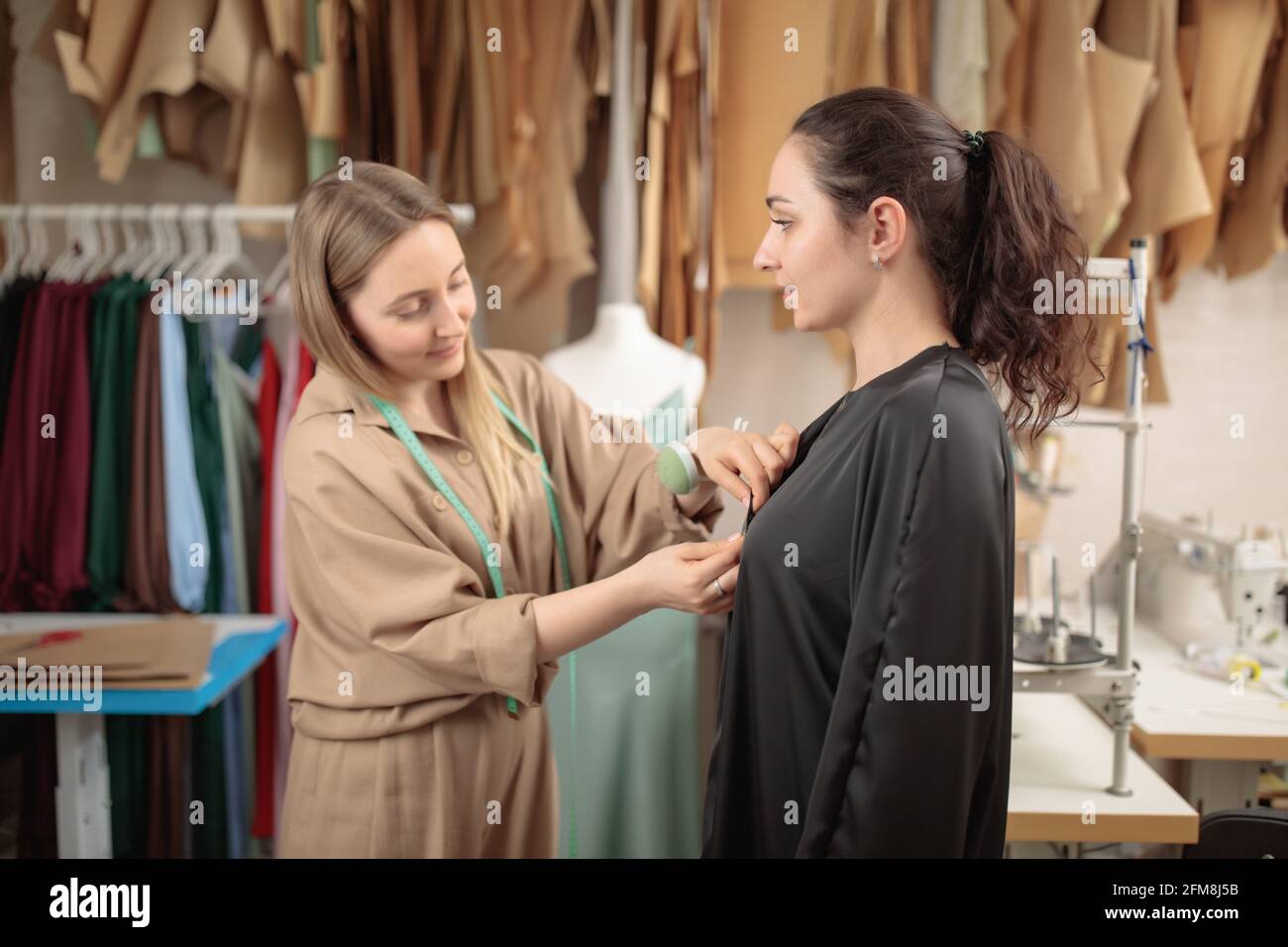 Tailor taking measurements customer hi-res stock photography and images ...