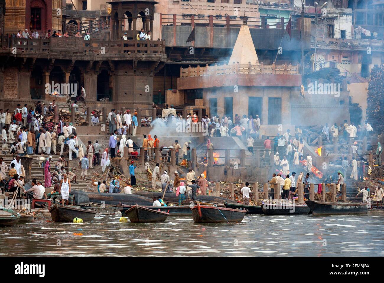 The Hindu Cremation Ghats on the banks of the Holy River Ganges at ...