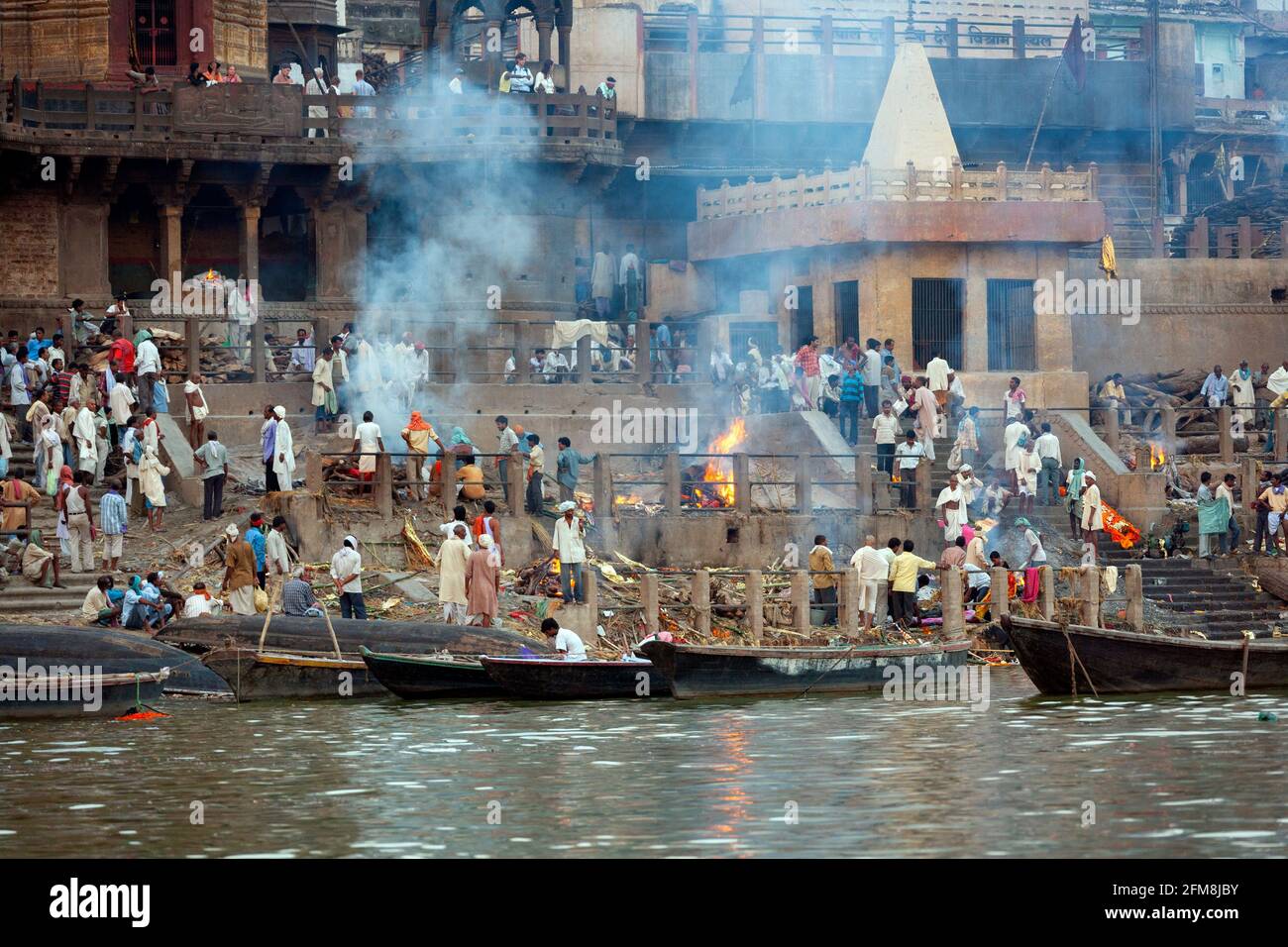 The Hindu Cremation Ghats on the banks of the Holy River Ganges at ...