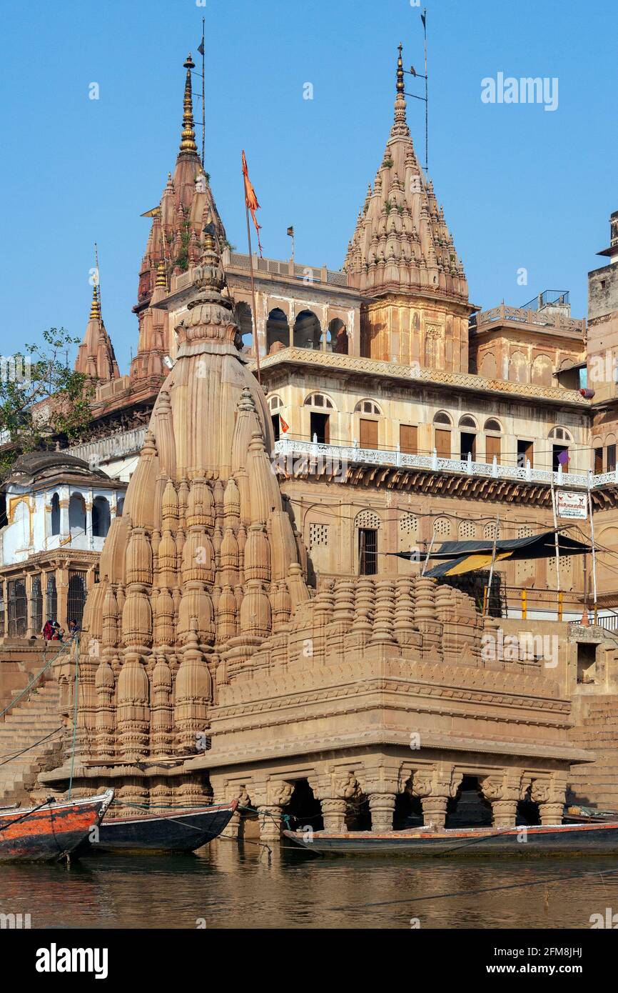 Temples on the Hindu Ghats on the banks of the Holy River Ganges at ...