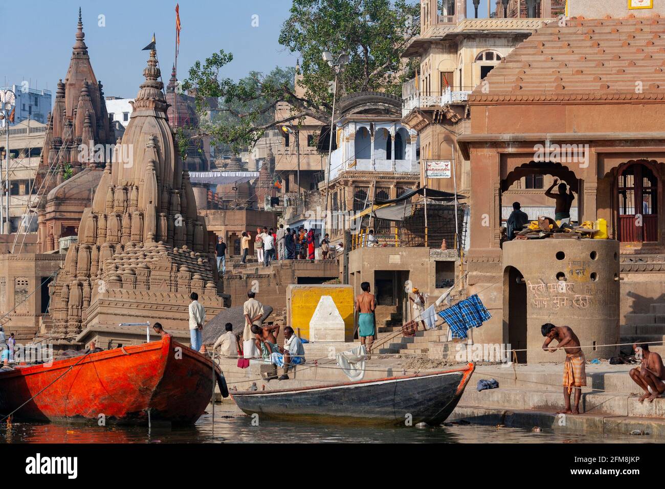 Temples on the Hindu Ghats on the banks of the Holy River Ganges at ...