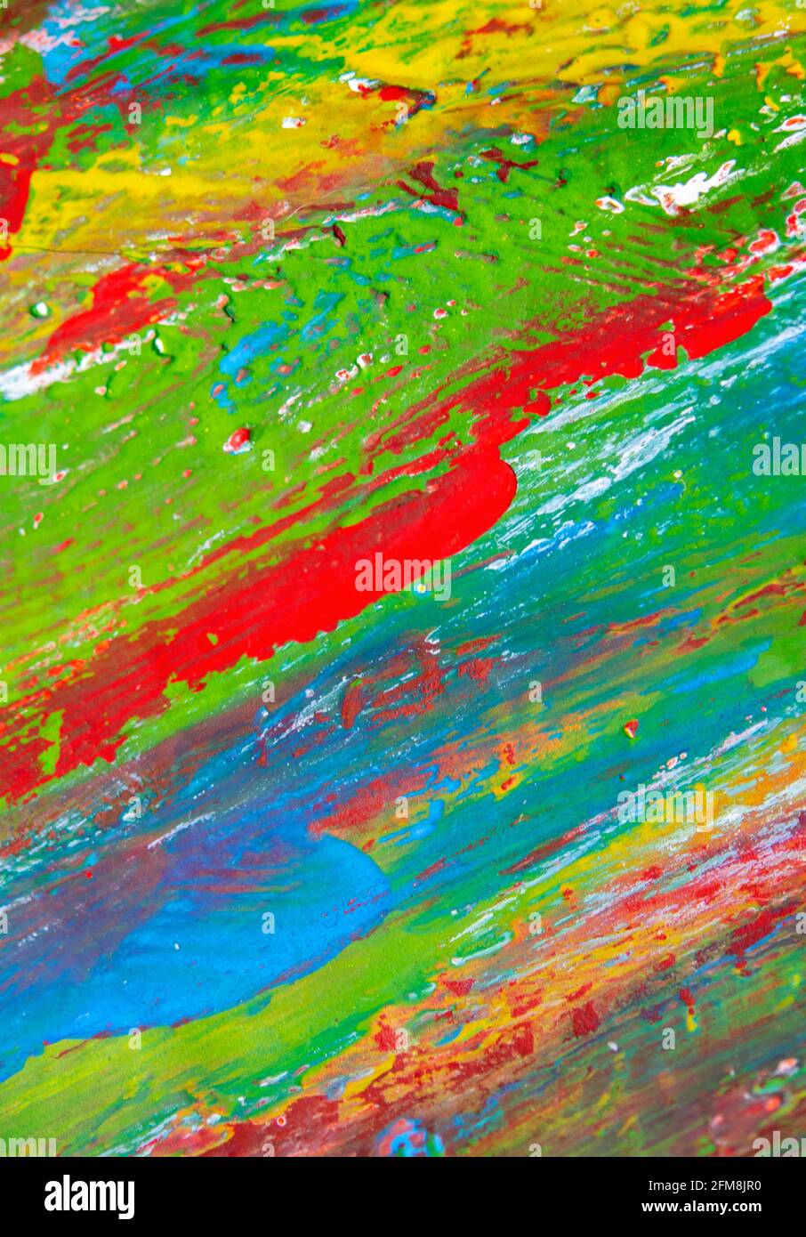 Background from different strokes of red, yellow, green and blue paint ...