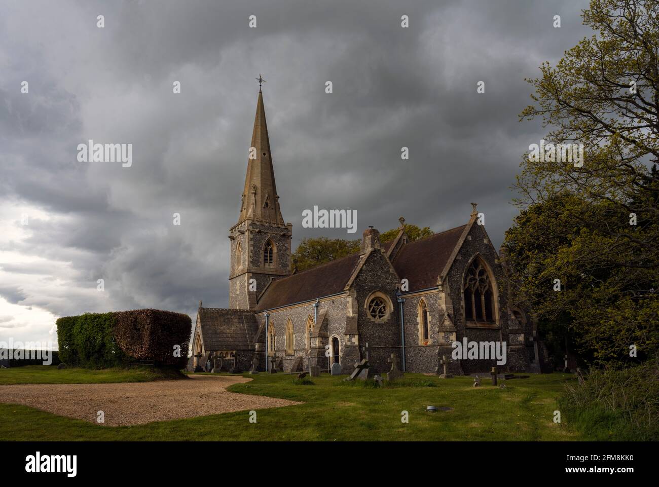 Church and storm clouds Stock Photo - Alamy