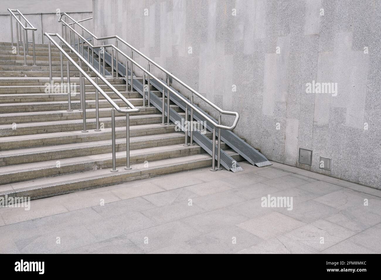 Outdoor staircase and wheelchair ramp. Urban interior. Exit or entrance ...