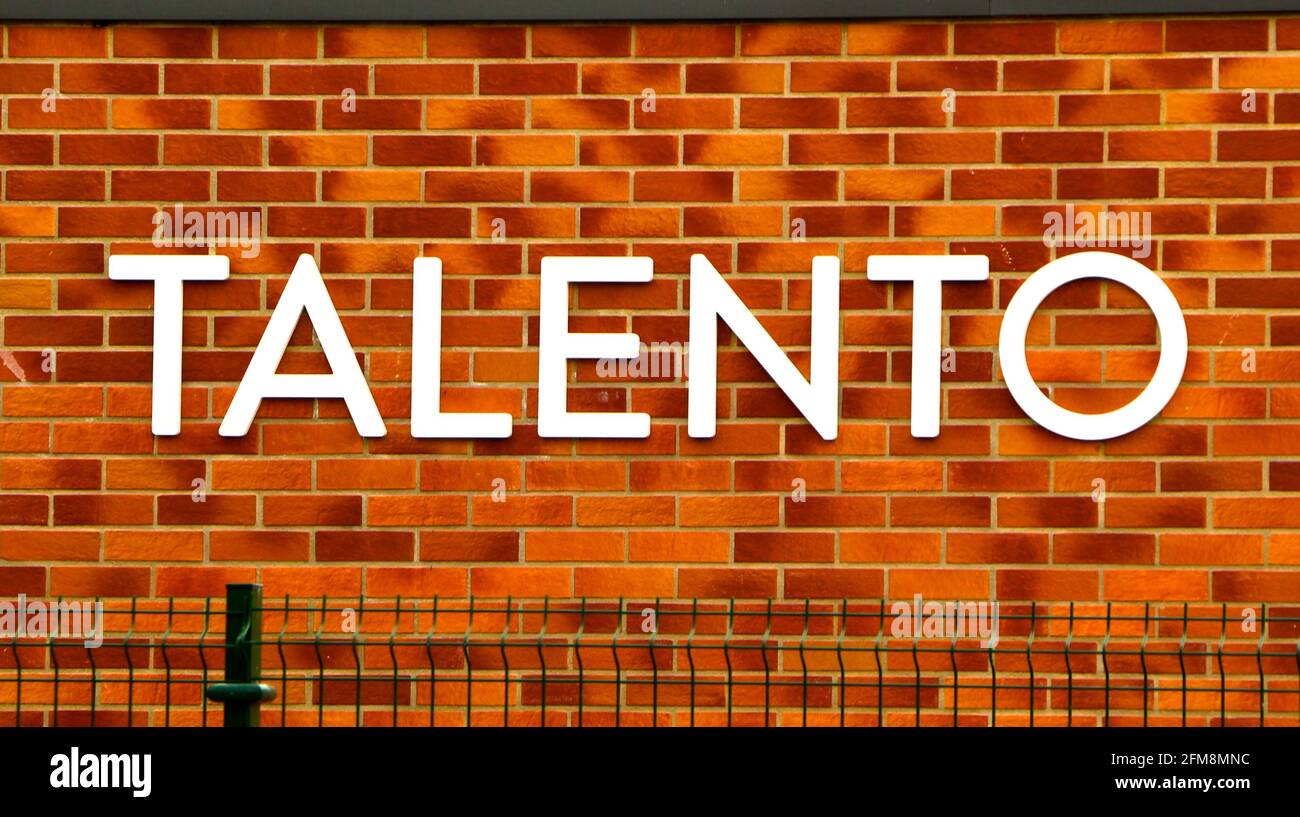 Talento Talent Spanish school sign in large white capital letters on a ...
