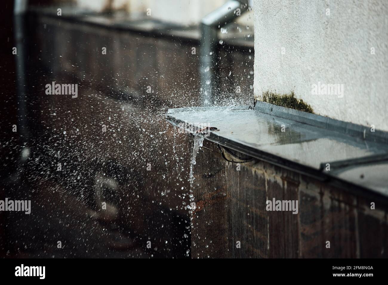 Water running down the gutter hi-res stock photography and images - Alamy