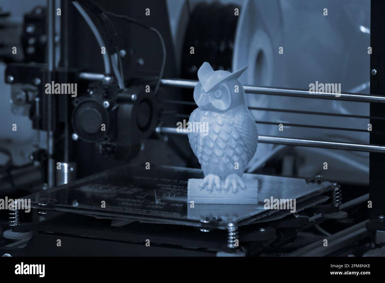 Modern 3D printer printing figure close-up. Automatic three dimensional ...
