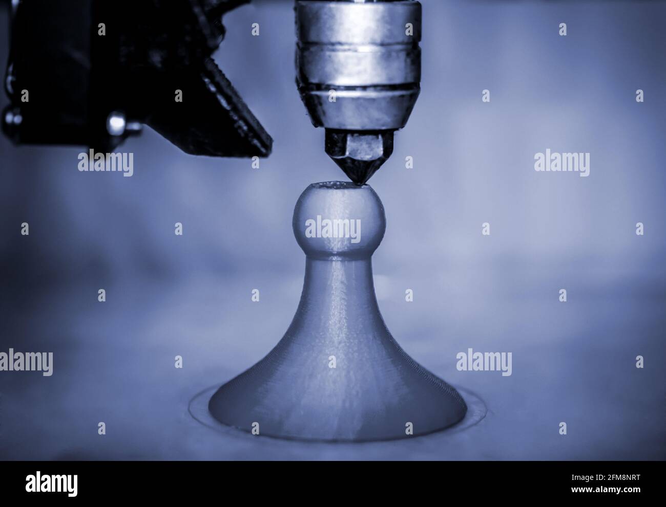 Modern 3D printer printing figure blue colors close-up Stock Photo - Alamy
