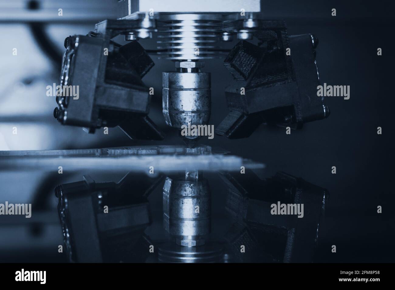 3D printer print isolated objects on mirror reflective surface close-up ...