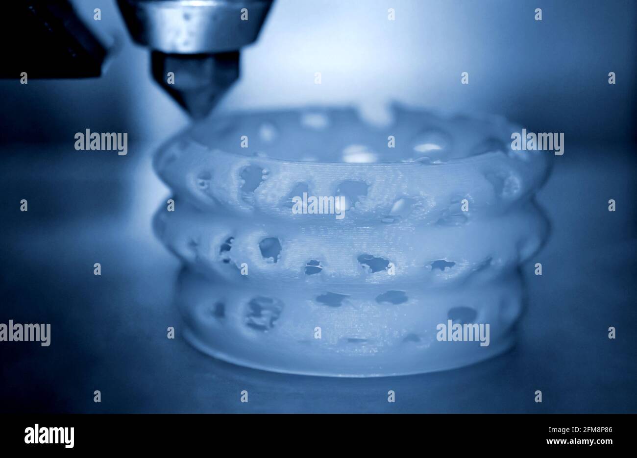 3d printer printing objects blue gray color form closeup Stock Photo ...