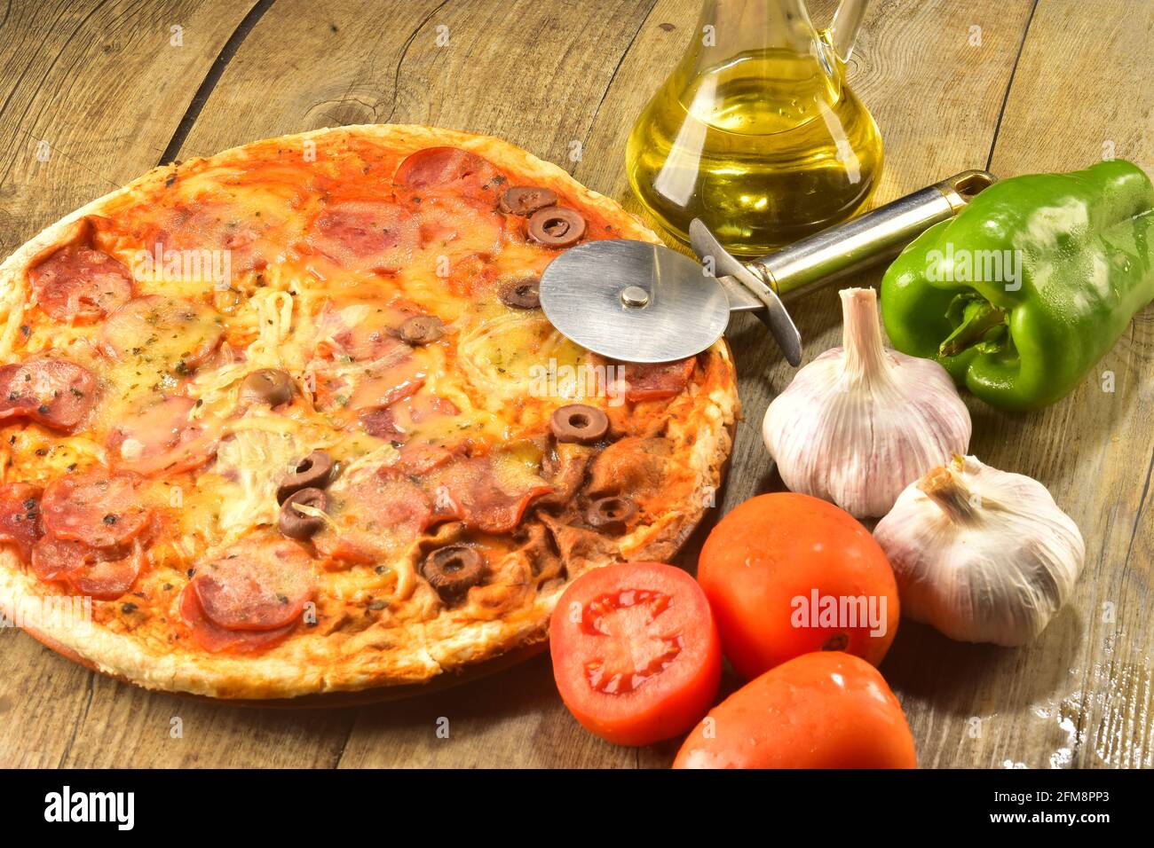 Pizza on the table, italian food Stock Photo - Alamy