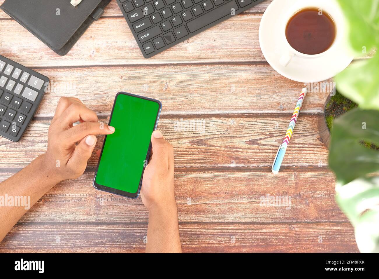 Man scrolling phone green screen hi-res stock photography and images ...