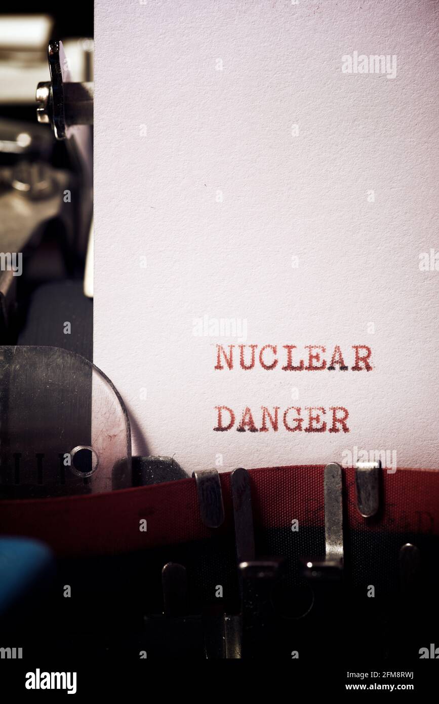 Nuclear danger phrase written with a typewriter Stock Photo - Alamy