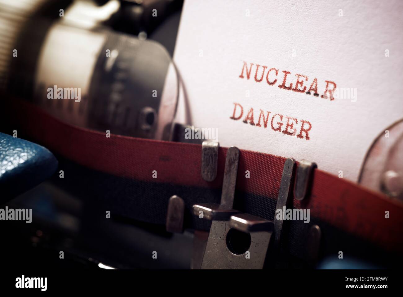 Nuclear danger phrase written with a typewriter Stock Photo - Alamy