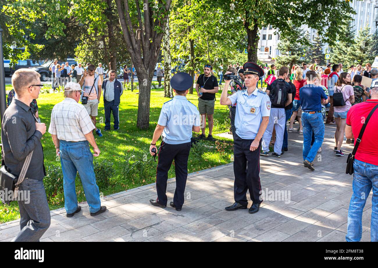 Samara, Russia - September 9, 2018: Police officer filming an ...
