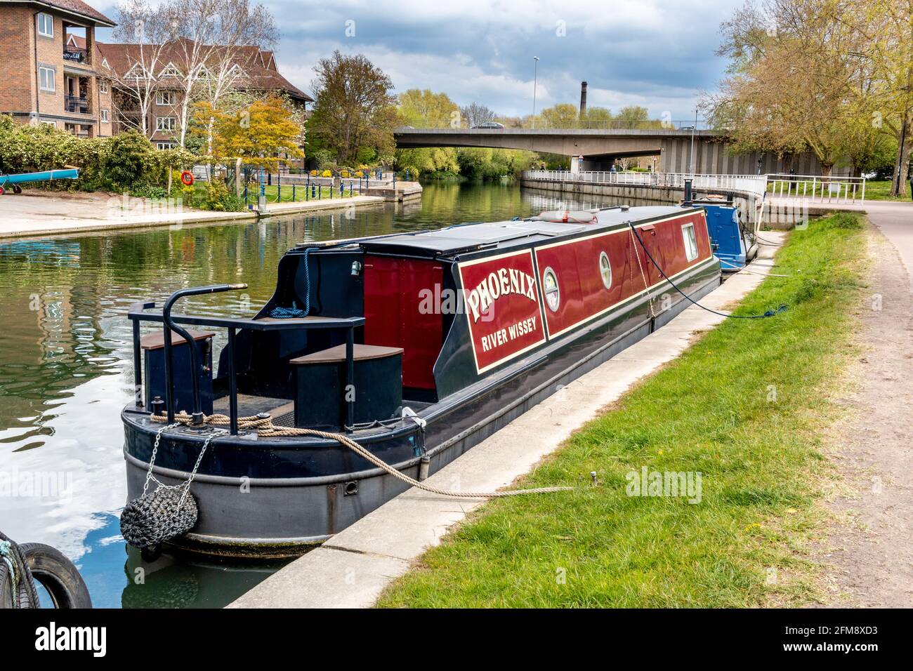 A view of the River Cam with the narrowboat Phoenix moored at Midsummer ...