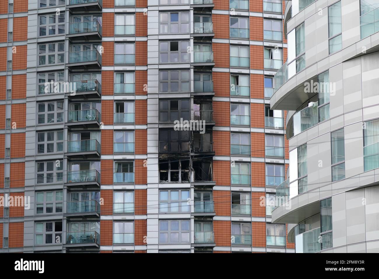 Fire damage to cladding on tower block hi-res stock photography and ...