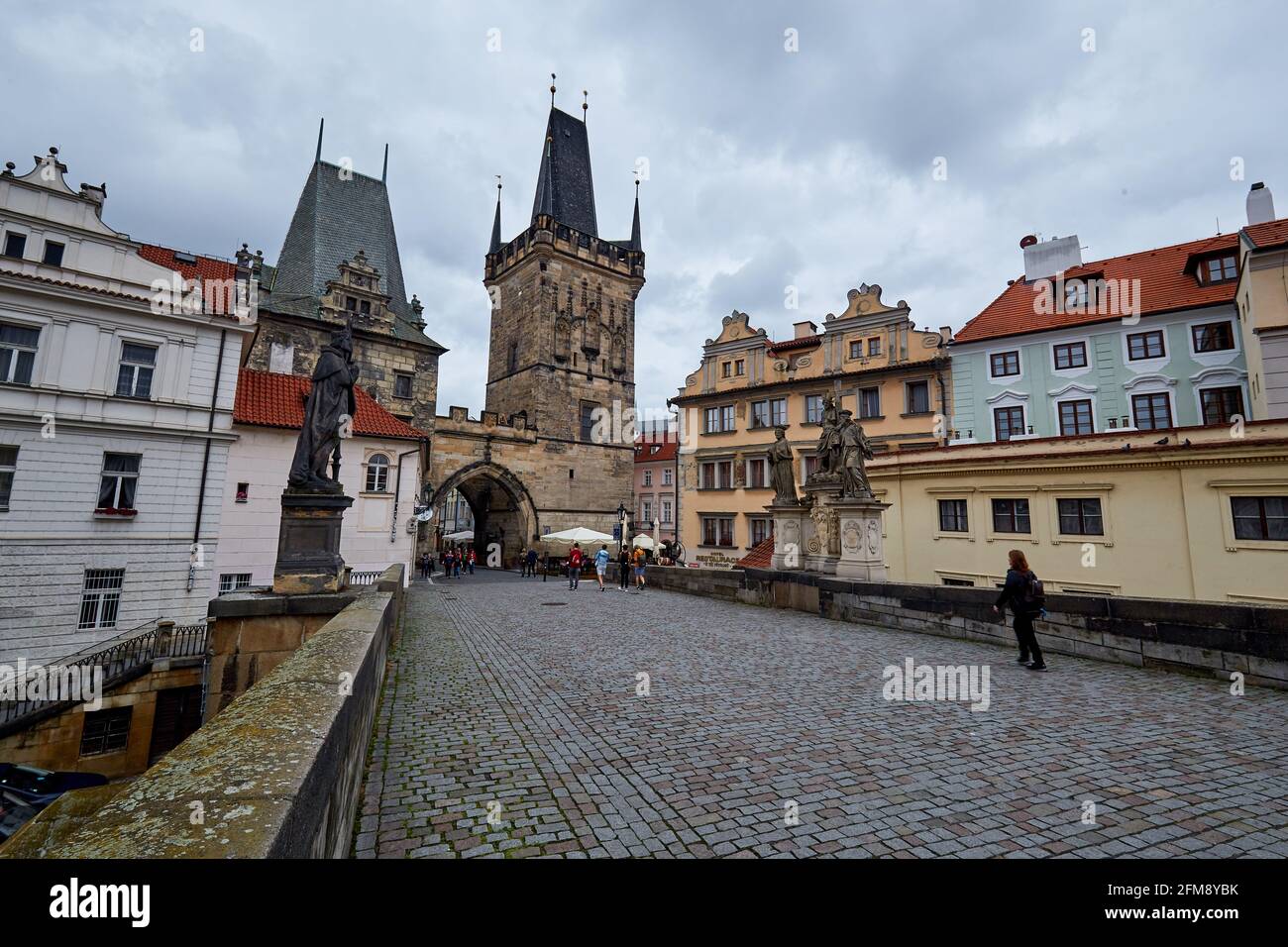 PRAHA, CZECH REP., JUN 11, 2020: Charles bridge with its statues in Prague and Vltava river ...