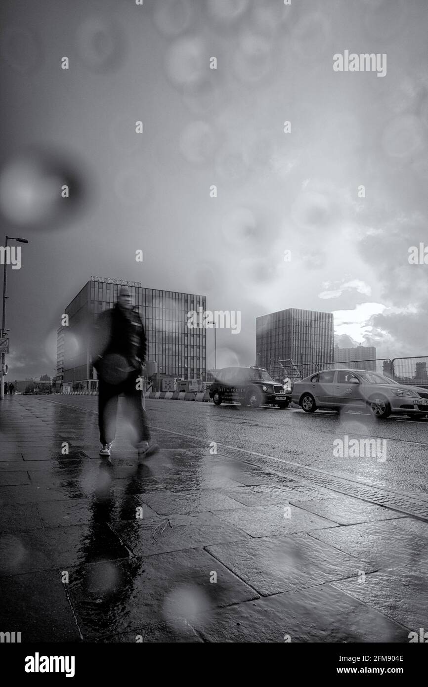 Street photography in rain hi-res stock photography and images - Alamy