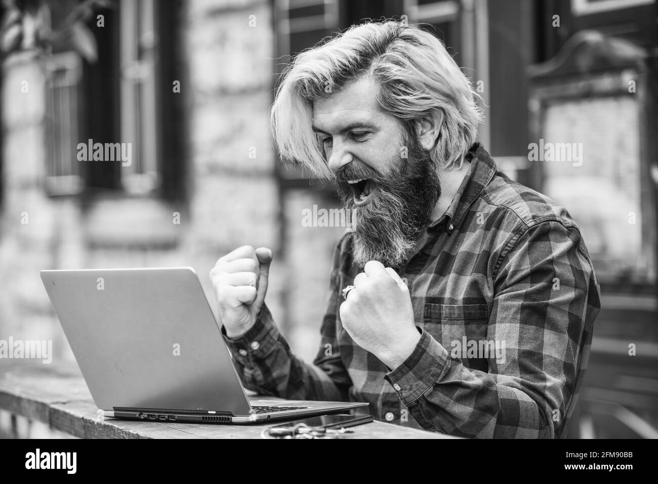 Living in digital age. Freelancer man working on computer. Businessman ...