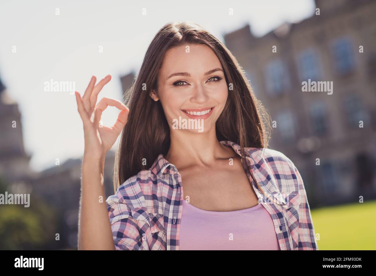 Photo of happy pretty young woman make okay sign approve good mood ...