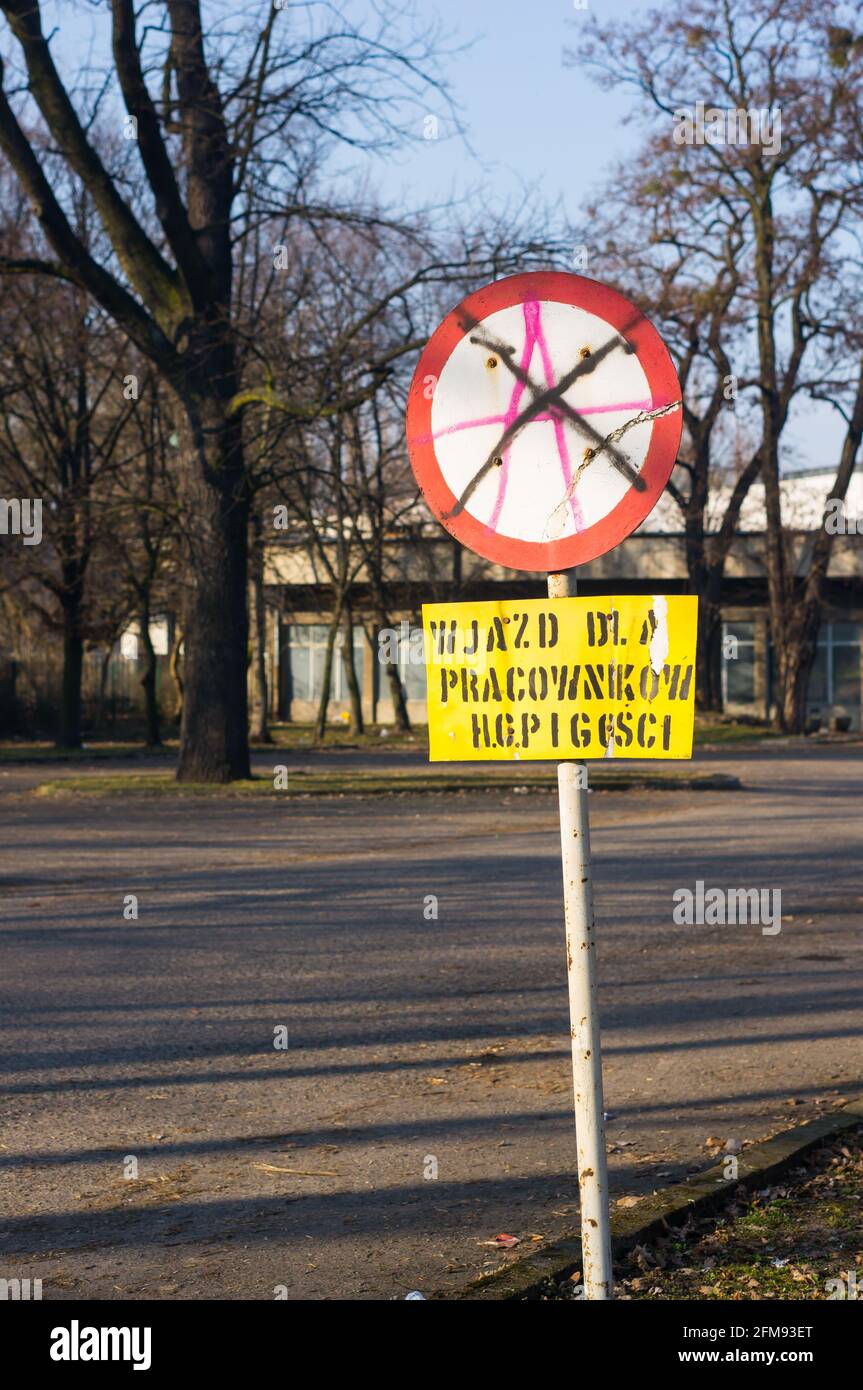 POZNAN, POLAND - Mar 10, 2014: Old warning sign at a park in the city ...