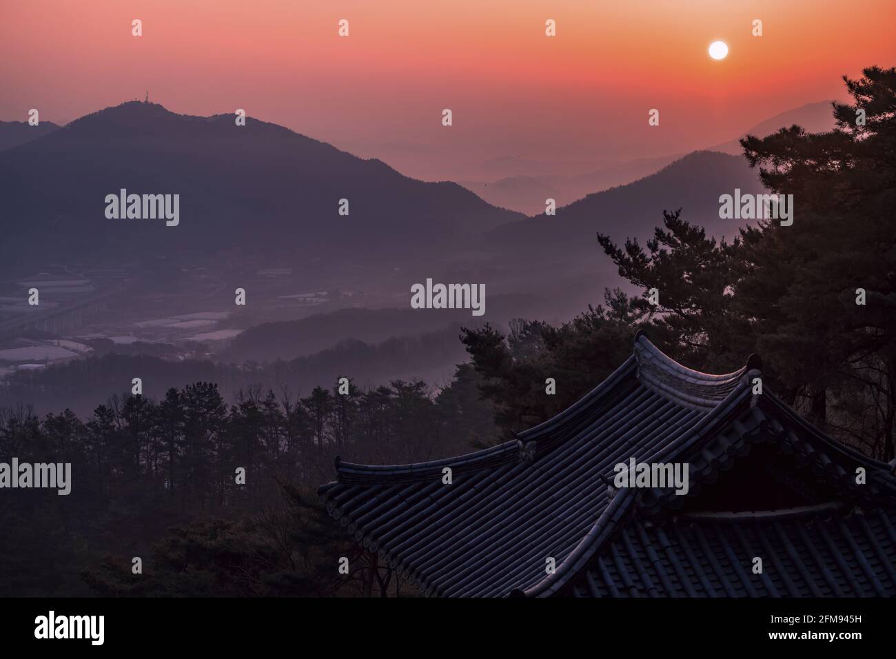 Sunset view of Buddhist temple Stock Photo - Alamy
