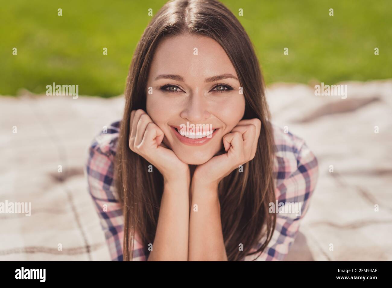 Photo of beaming smile nice young student woman hold hands cheekbones ...