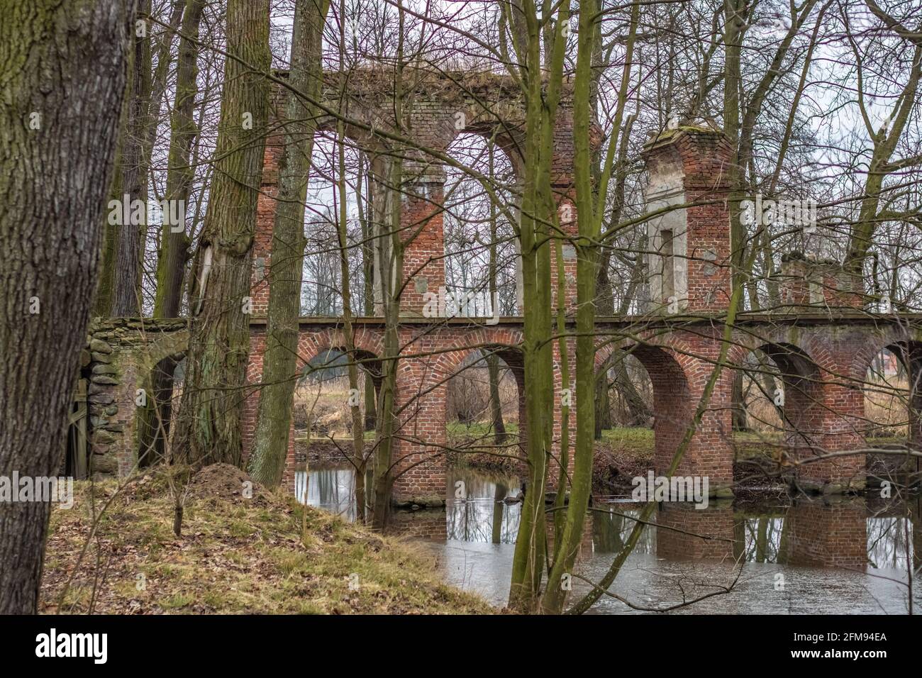 Ancient stone viaduct in a forest Stock Photo - Alamy