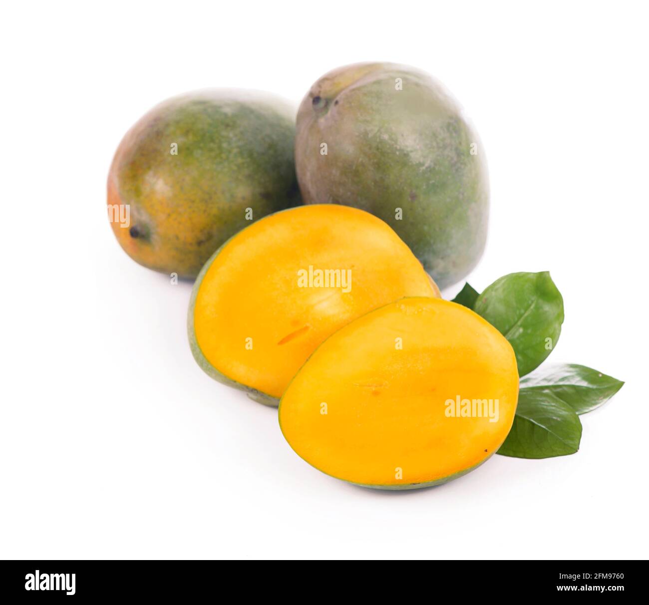 mango fruit and leaves isolated on white background Stock Photo - Alamy