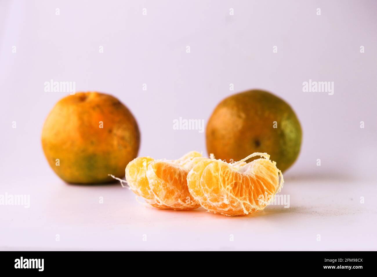 KERALA, INDIA - Feb 16, 2021: Orange ponkan, orange ponkan open on a ...