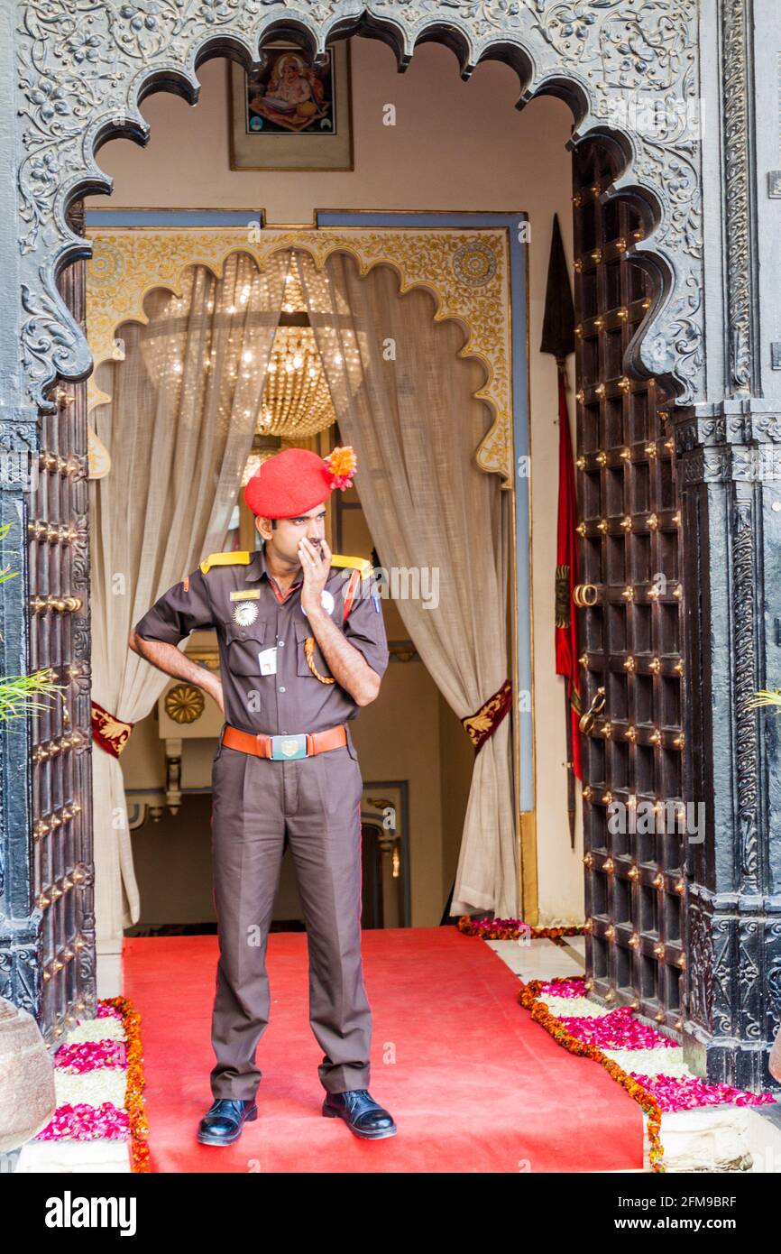 Indian man security guard portrait hi-res stock photography and images ...