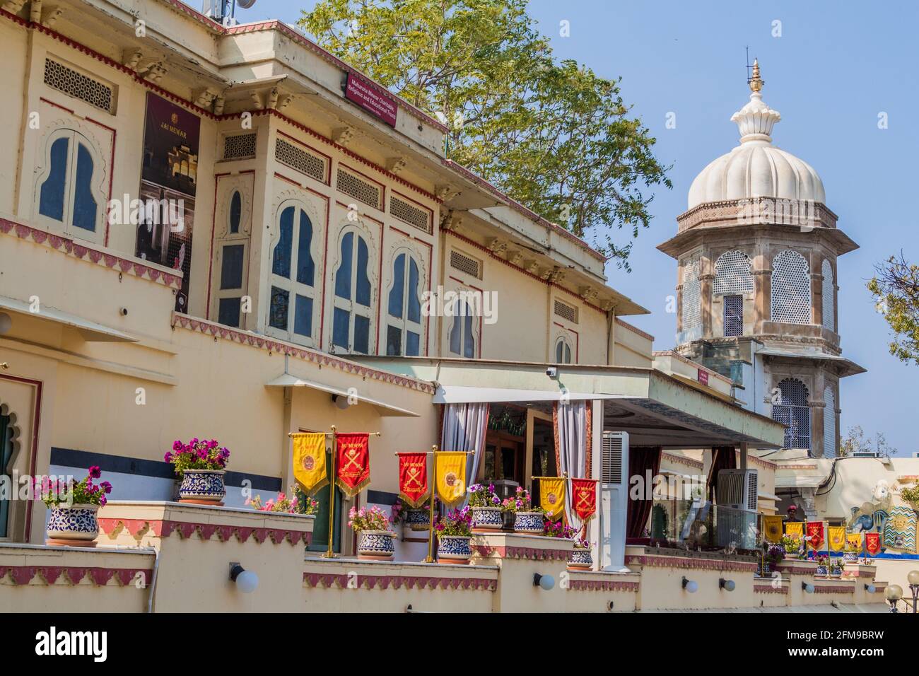 UDAIPUR, INDIA - FEBRUARY 12, 2017: Jai Mewar flags at the City Palace ...