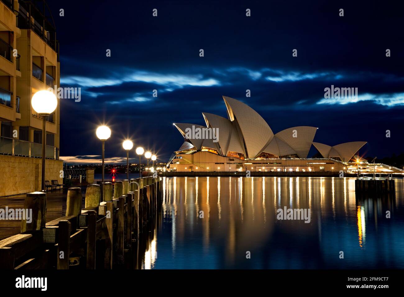 Sydney Opera House with leading line of street lights Stock Photo - Alamy