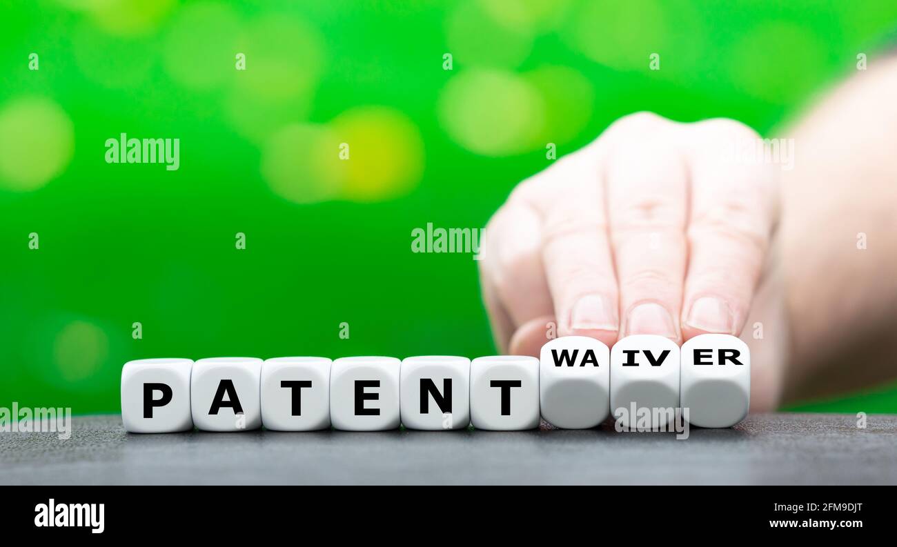 Symbol for waiver of patent rights on Covid vaccines Stock Photo - Alamy