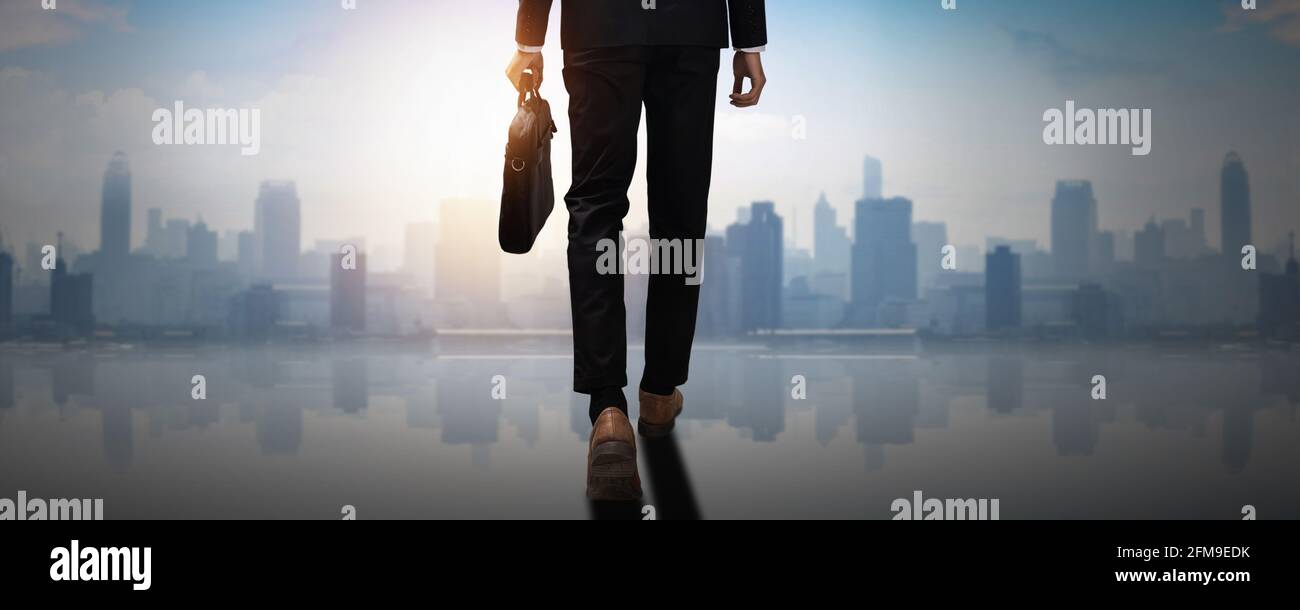 forward to success, back of confident businessman holding business ...