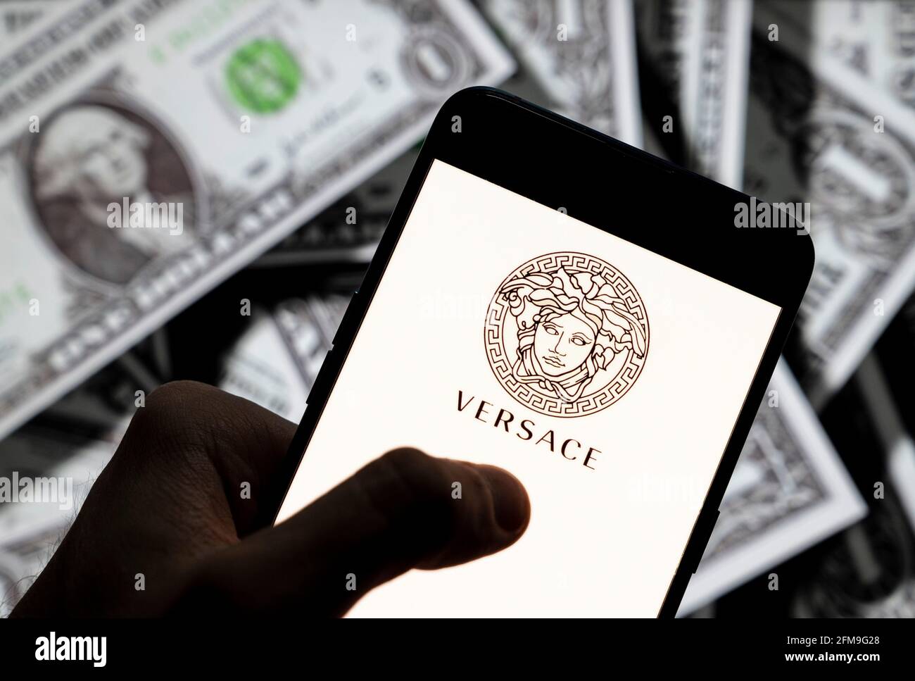 In this photo illustration the Italian luxury fashion company Versace ...