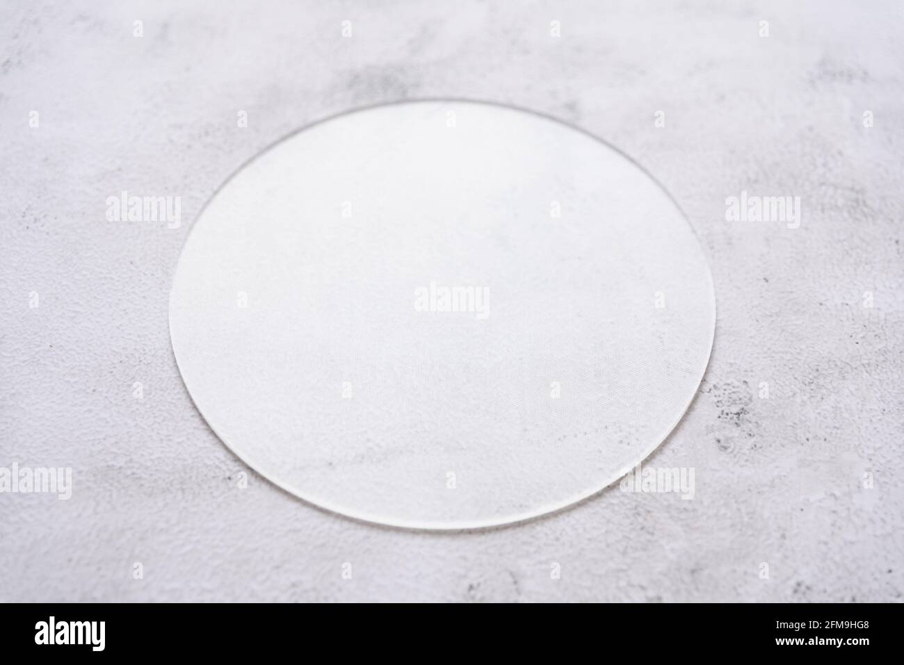 Transparent circular crystal wafer for the new quantum technology Stock ...