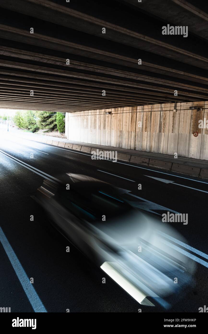 Car wake, swept, driving on fossil fuel on a dark city road Stock Photo ...