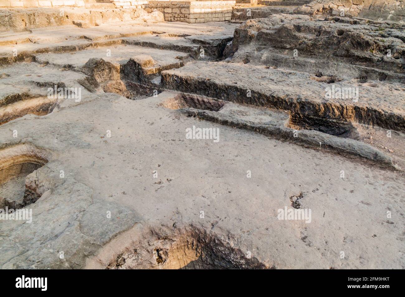 Ruins of Buddhist caves at Uparkot Fort in Junagadh, Gujarat state ...