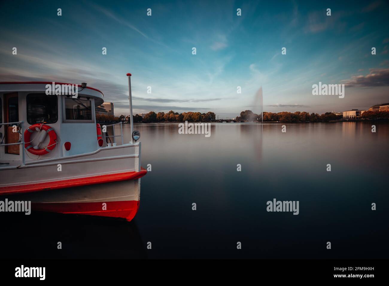 Alster Lake with traditional steamer boat for cruise on the water in ...
