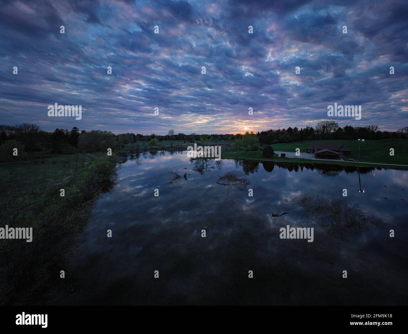 Aerial view lake trees under cloudy sky hi-res stock photography and ...