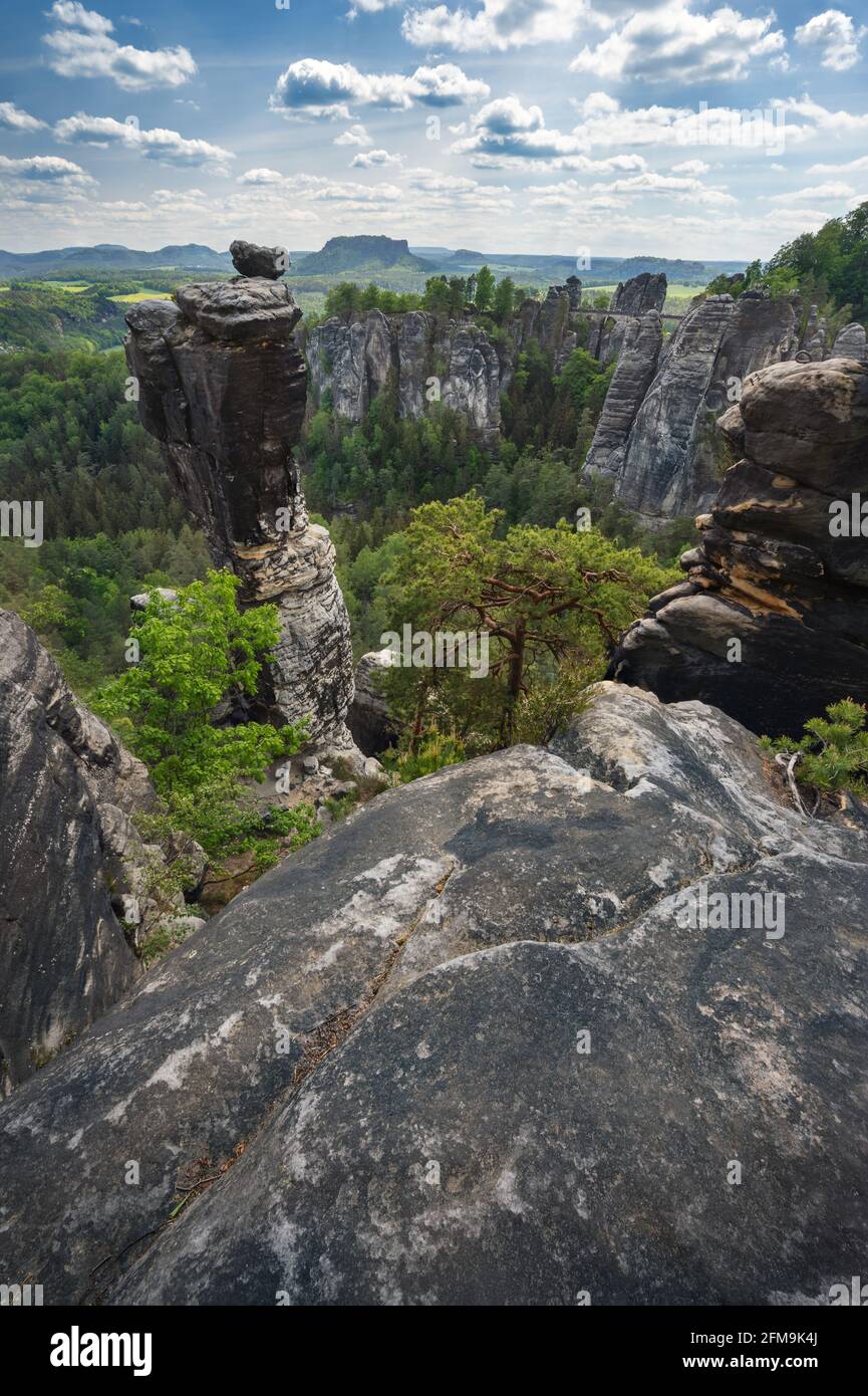 Unrecognized silhouette climber on mountain top enjoying famous Bastei ...