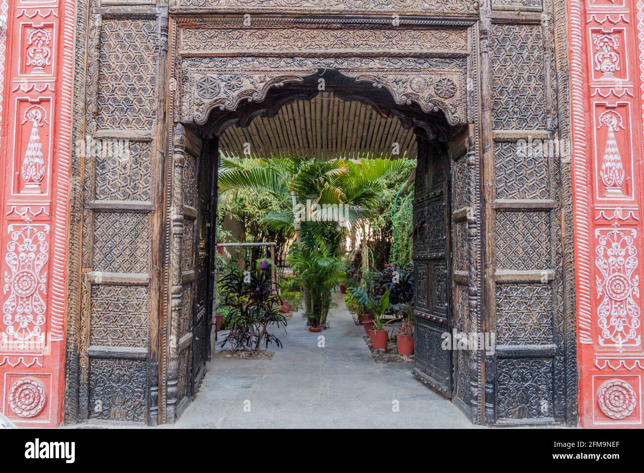 Decorated wooden gate in Udaipur, Rajasthan state, India Stock Photo ...