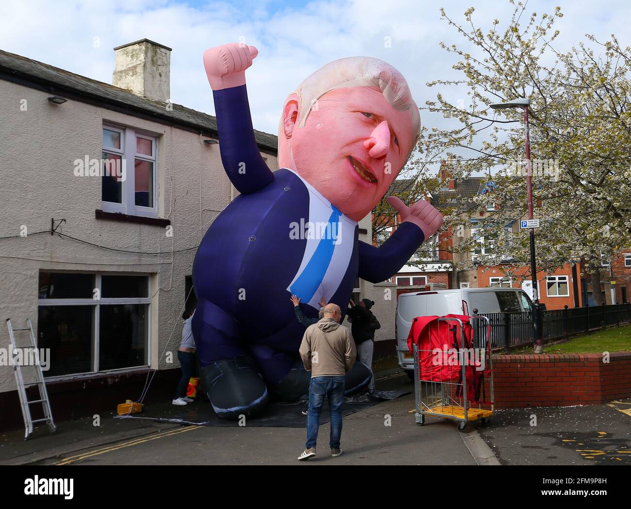 Deflated inflatable house hi-res stock photography and images - Alamy
