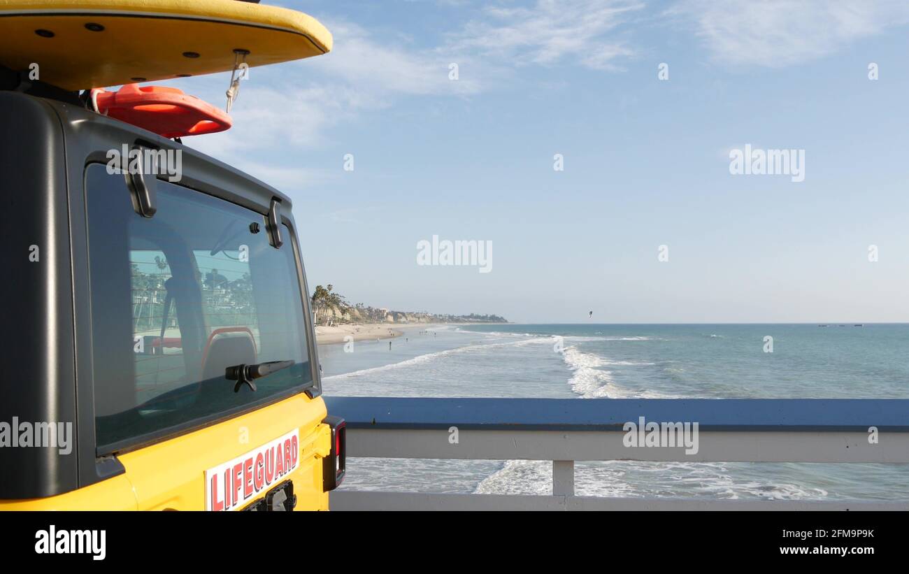 Yellow lifeguard car, San Clemente beach pier, California USA ...