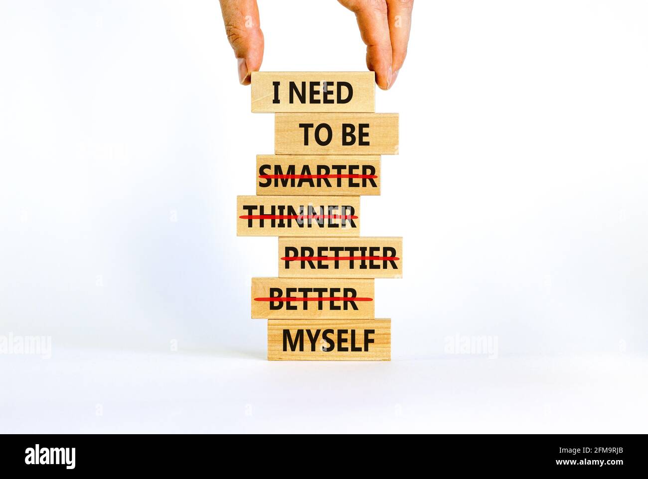 Be myself symbol. Businessman hand. Wooden blocks with words 'i need to ...